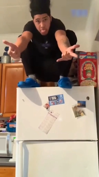 Guy Accidentally Falls Off Refrigerator While Trying to Make Poses on ...