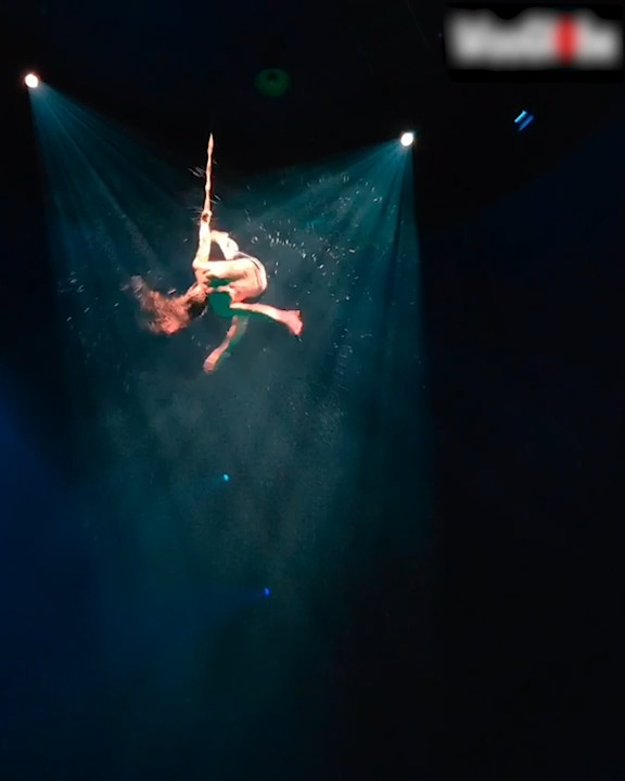 Circus Artist Performs Amazing Moves While Spinning on Aerial Strap ...