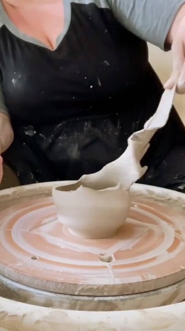 Woman Doing Pottery Fails to Form Vase From Wet Clay | Jukin Licensing