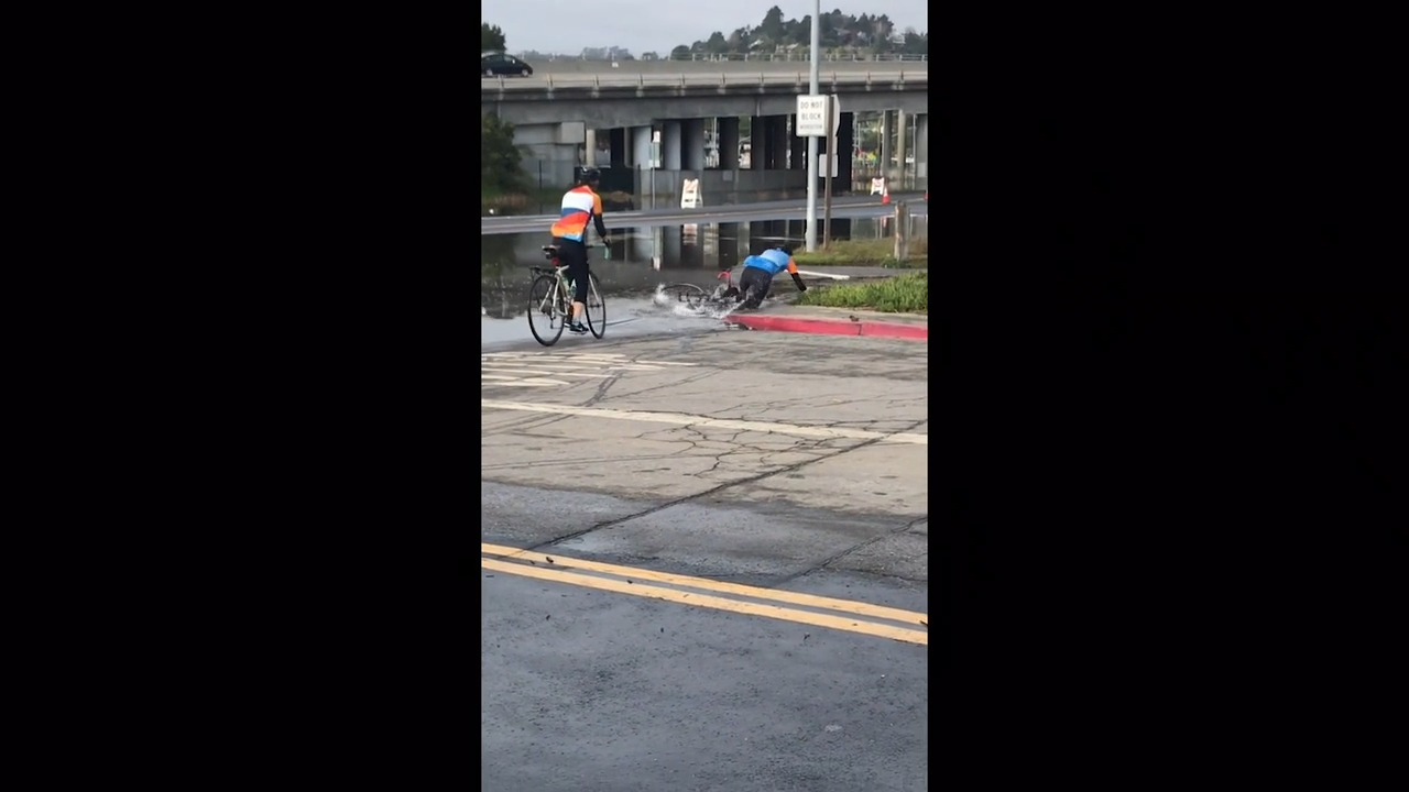 Person Watches Bikers Fall into Same Pothole | Jukin Licensing