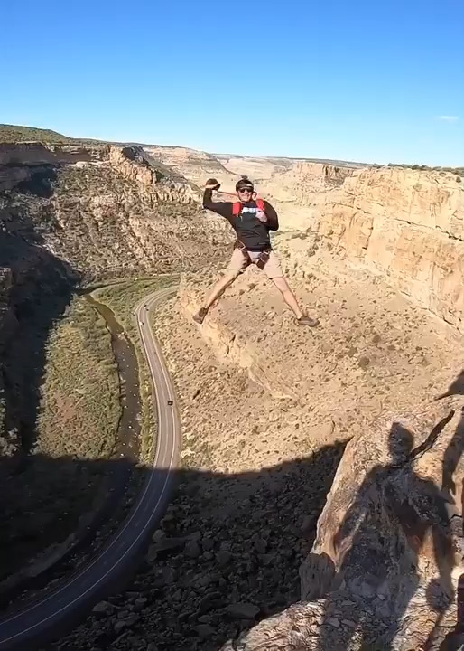 Guys Attempt Base Jumping Off Cliff Near Highway | Jukin Licensing