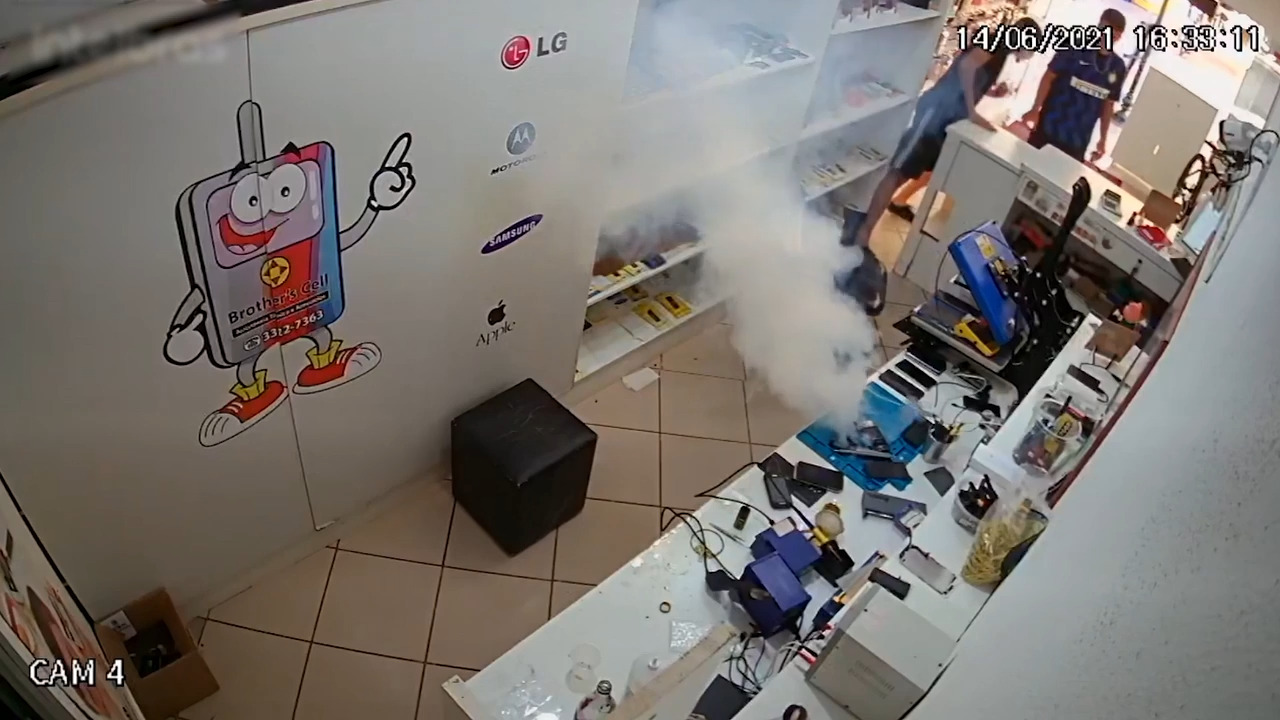 Cell Phone Battery Smokes in Shop | Jukin Licensing