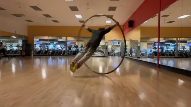 Guy Performs Insane Tricks With Cyr Wheel | Jukin Licensing