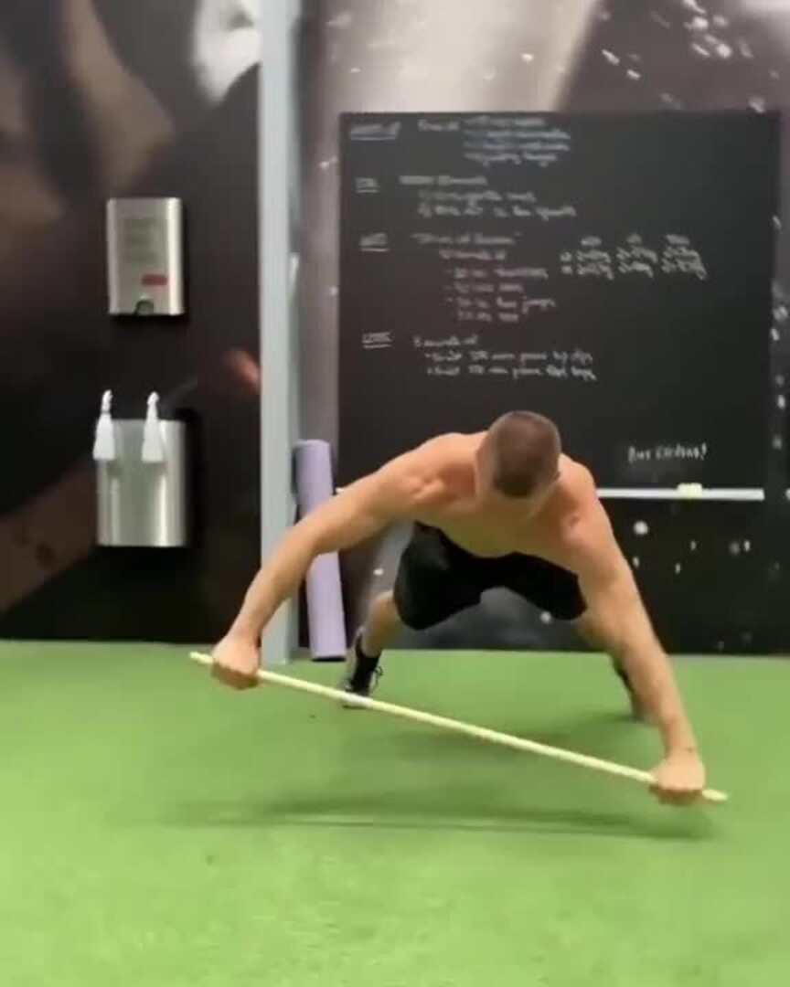 Man Performs Pushups While Balancing With Stick | Jukin Licensing