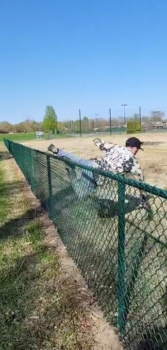 Guy Falls Hilariously While Attempting to Jump Over Fence | Jukin Licensing