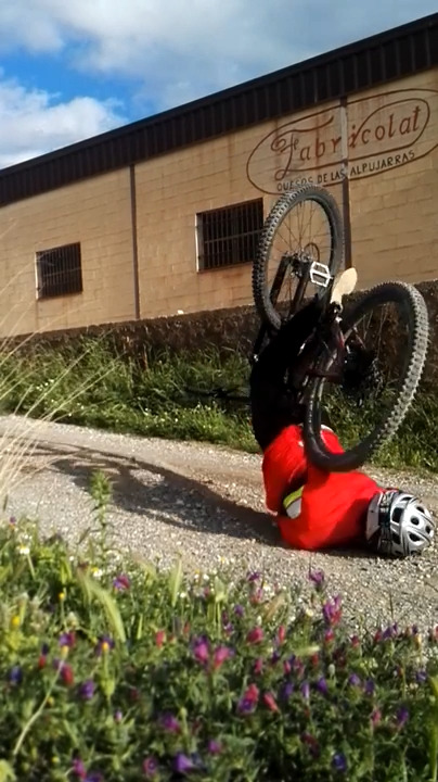 Guy Riding Bike on Ledge Faceplants to Ground | Jukin Licensing