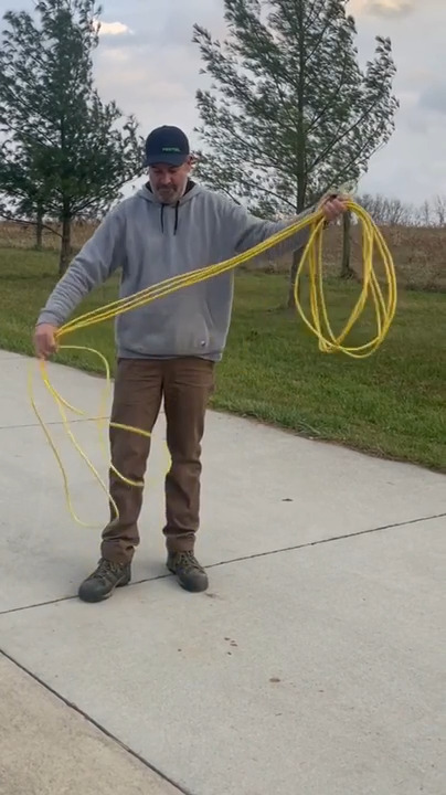 Man Shows Simple Method of Rolling Up Electric Cords | Jukin Licensing