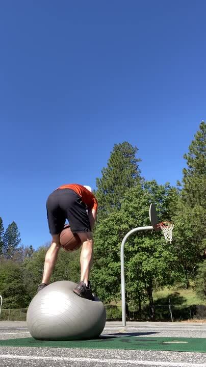 Guy Shoots Perfect Baskets While Standing on Stability Ball | Jukin ...