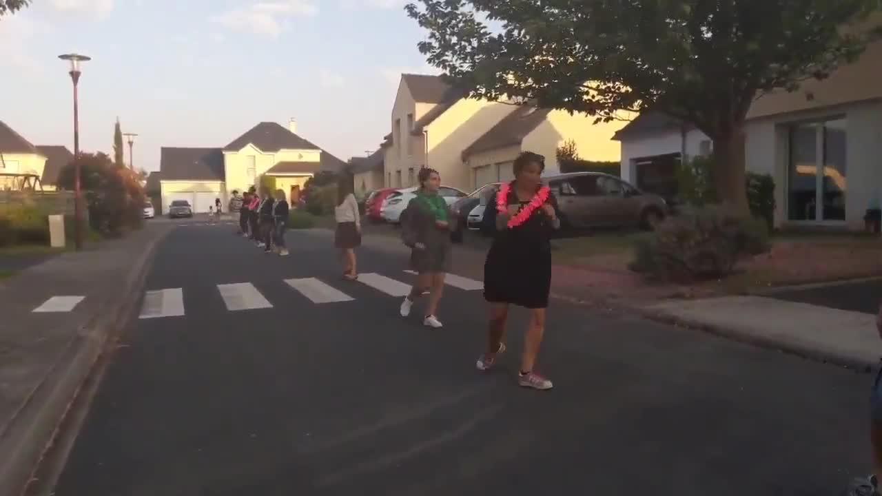 People Dance Outdoors in Queue to Praise Workers Bringing Essentials ...