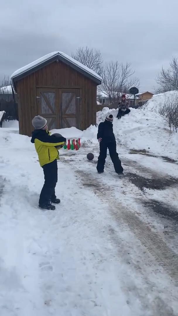 Kids Play Bowling Match in the Snow | Jukin Licensing