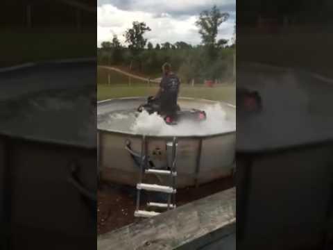 Guy Rides Quad Bike Into the Pool | Jukin Licensing