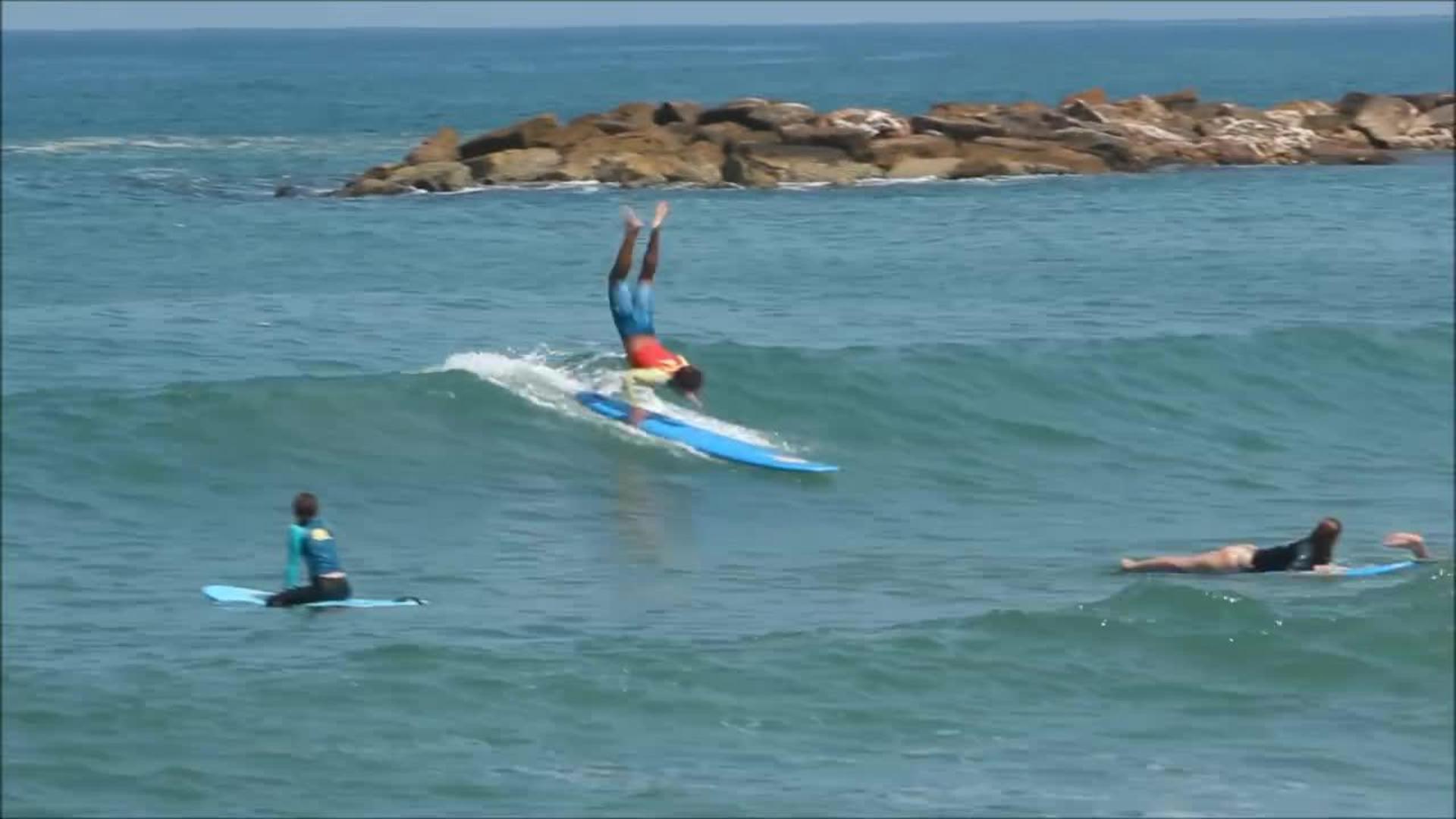Surfer Performs Backflips on Surfboard | Jukin Licensing