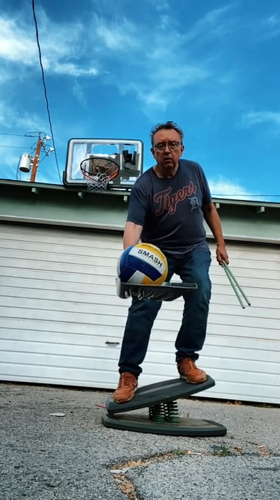 Guy Balancing on Springs Does Tricks With Ball and Shovel | Jukin Licensing