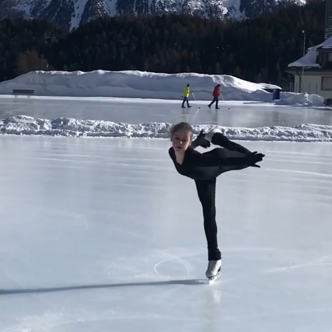 Spinning Figure Skater Balances Herself on One Leg While Stretching ...