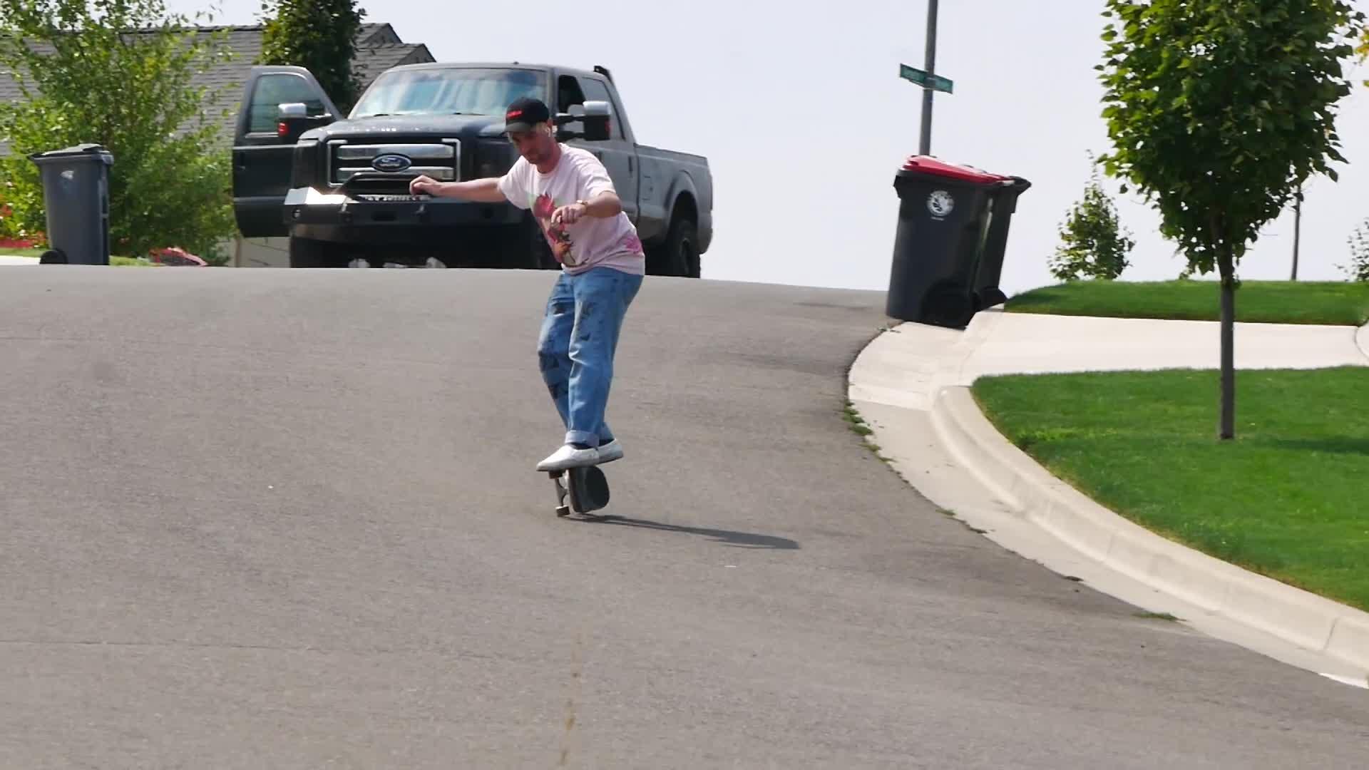 Guy Balances On Two Wheels Of His Skateboard And Attempts Coconut ...