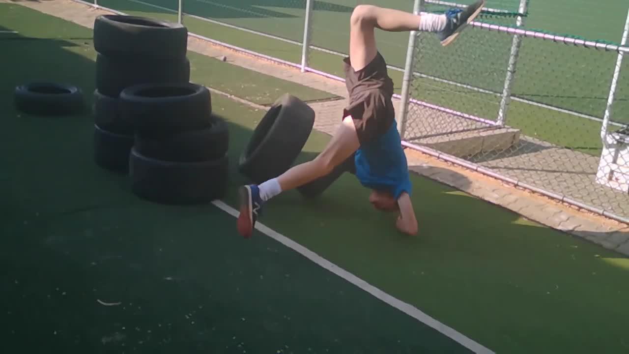 Guy Falls Hard on Ground While Trying to Jump Over Stack of Tires | Jukin Licensing