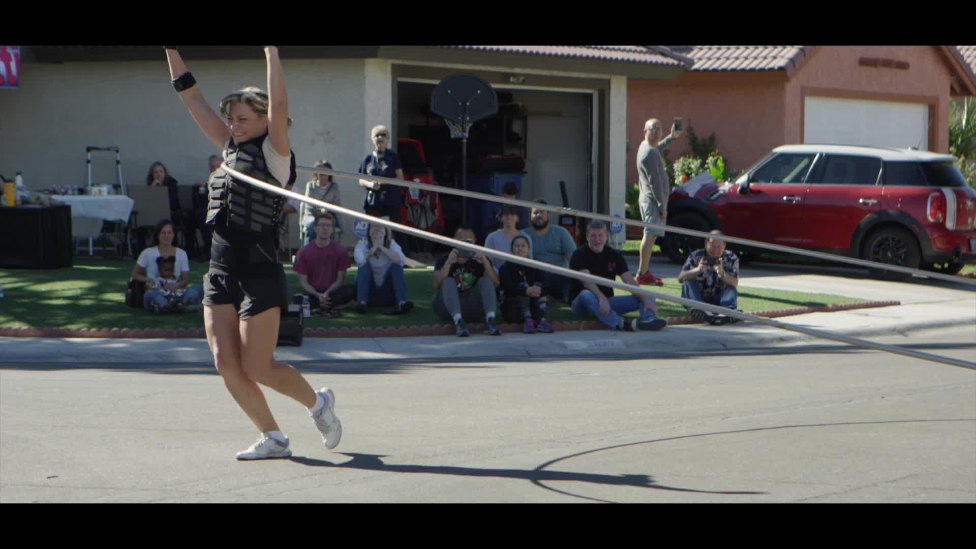 Woman Spins Massive Metal Hula Hoop Out on The Street | Jukin Licensing