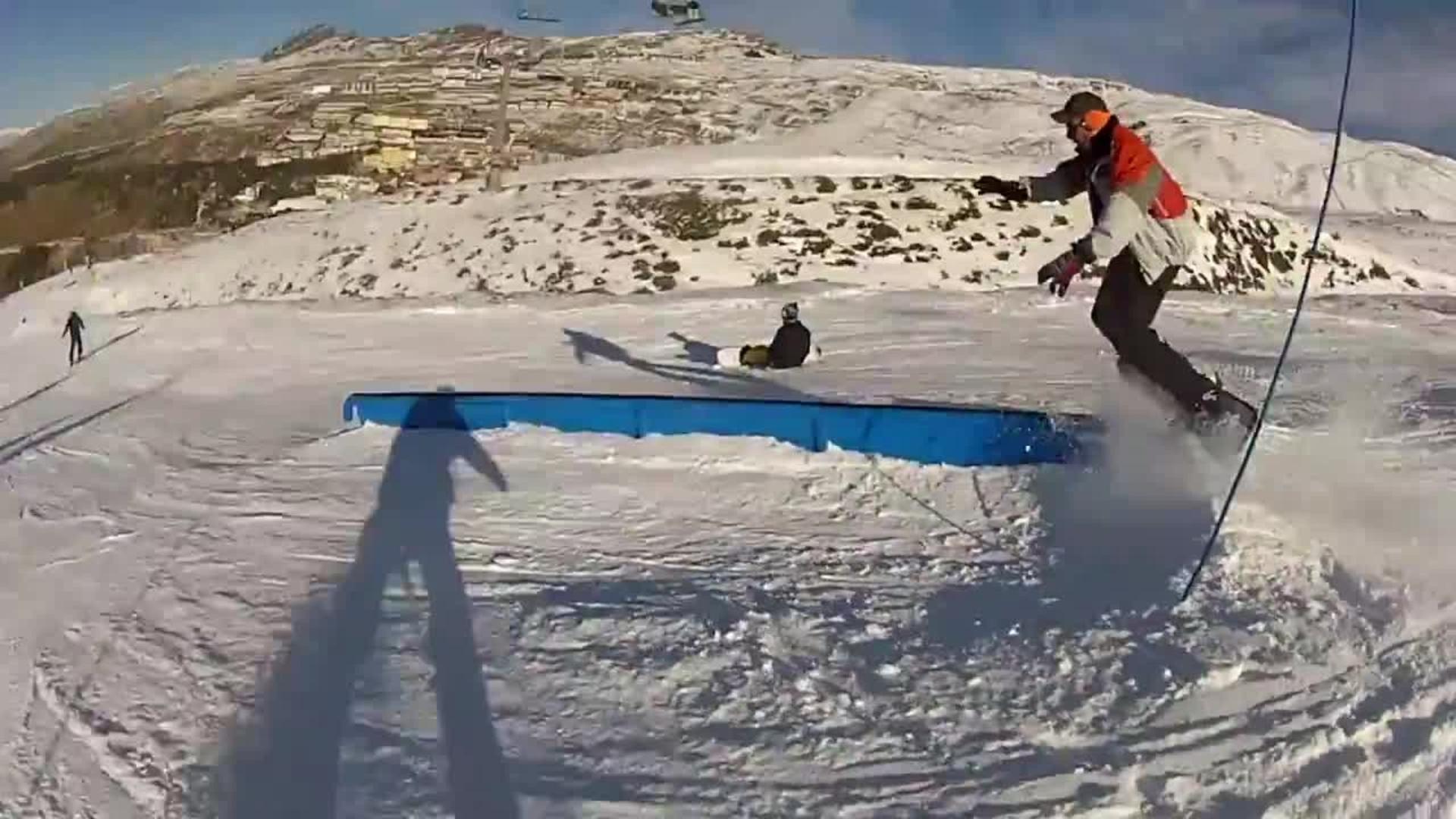 Snowboarder Faceplants on Rail Attempting Grind | Jukin Licensing