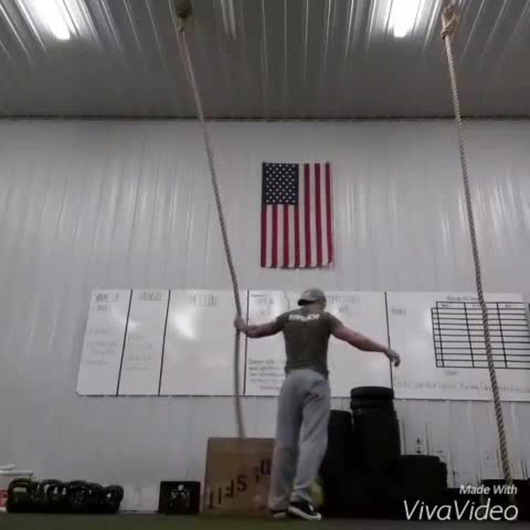 Man Catches Ball with Feet while Climbing Rope | Jukin Licensing