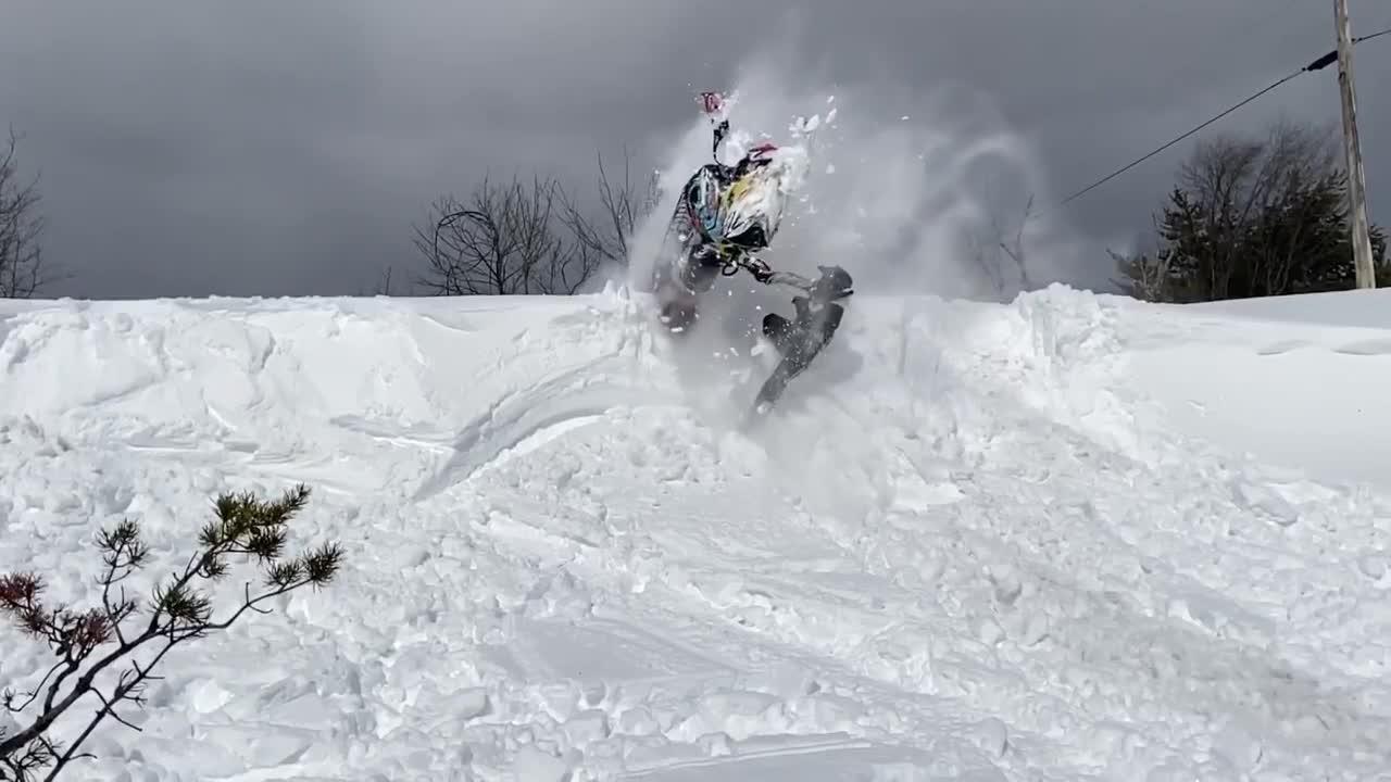 Person Falls While Trying 180 Degrees Pivot On Snowmobile Up Slope ...