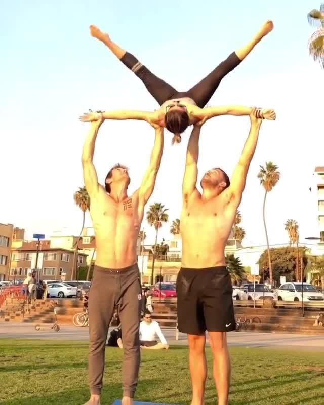 Guys Carry Girl for Acrobatic Swing | Jukin Licensing