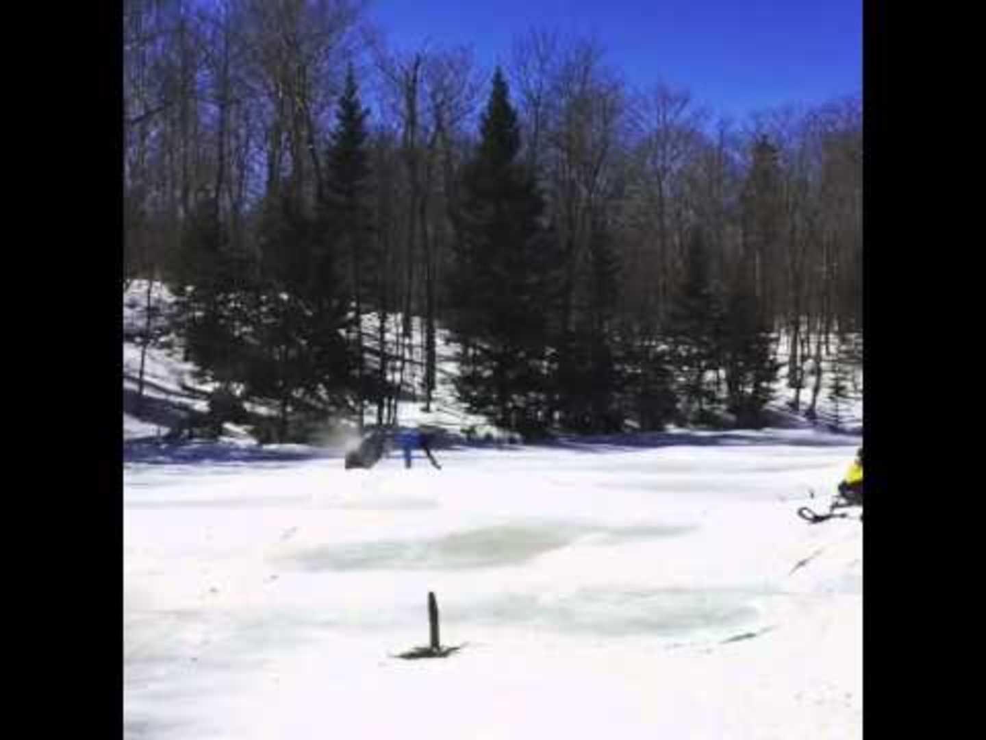 Snowmobile Takes off Into Trees | Jukin Licensing