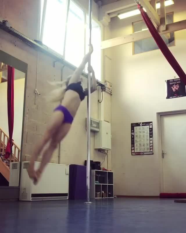 Pole Dancer Attempts Double Reverse Grab Spin | Jukin Licensing