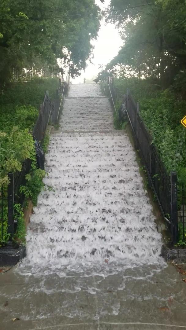 Heavy Rain Creates Waterfall on Staircase | Jukin Licensing