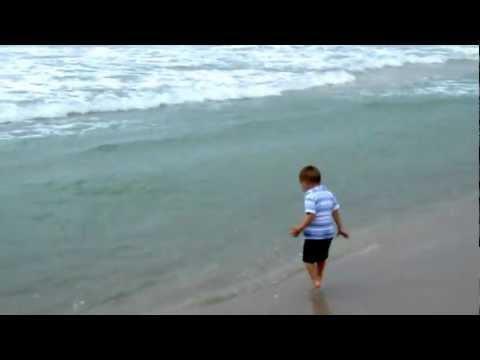 Toddler Knocked Down by Wave | Jukin Licensing