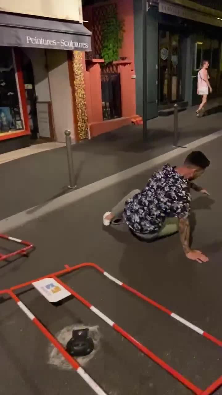 Guy Fails While Attempting to Jump Over Barrier on Road | Jukin Licensing