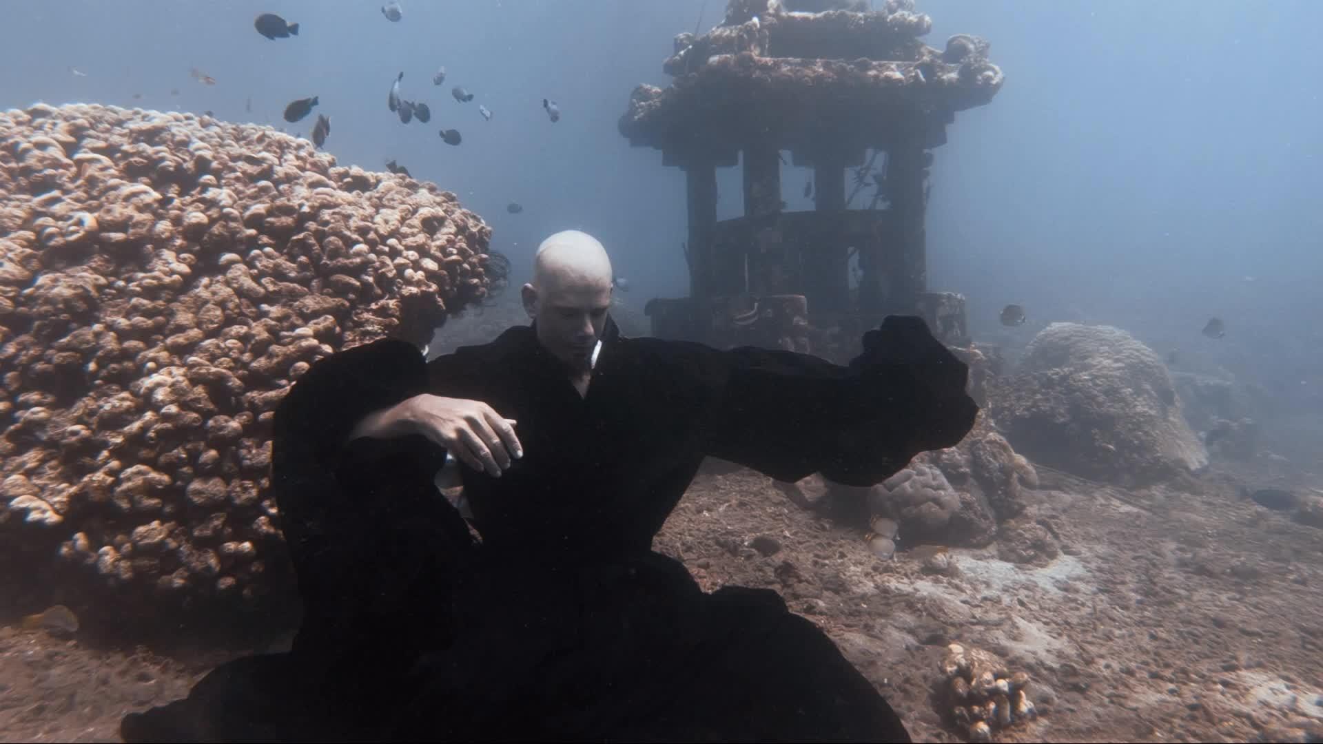 Monk Holds Breath and Meditates Next to Underwater Temple | Jukin Licensing