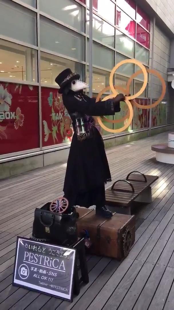 Person Wearing Plague Mask Performs Amazing Isolation Rings Juggling ...