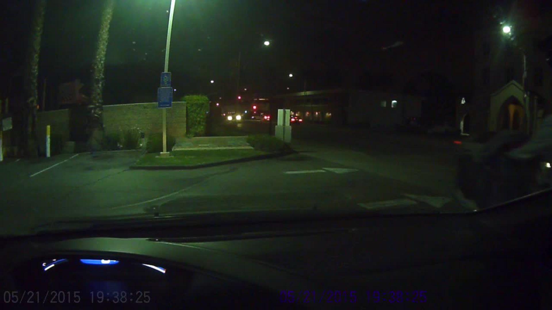 Car Runs Red Light Right in Front of Police | Jukin Licensing