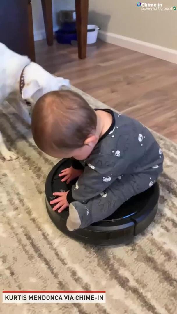 Toddler Enjoys Riding on Robot Vacuum Cleaner | Jukin Licensing