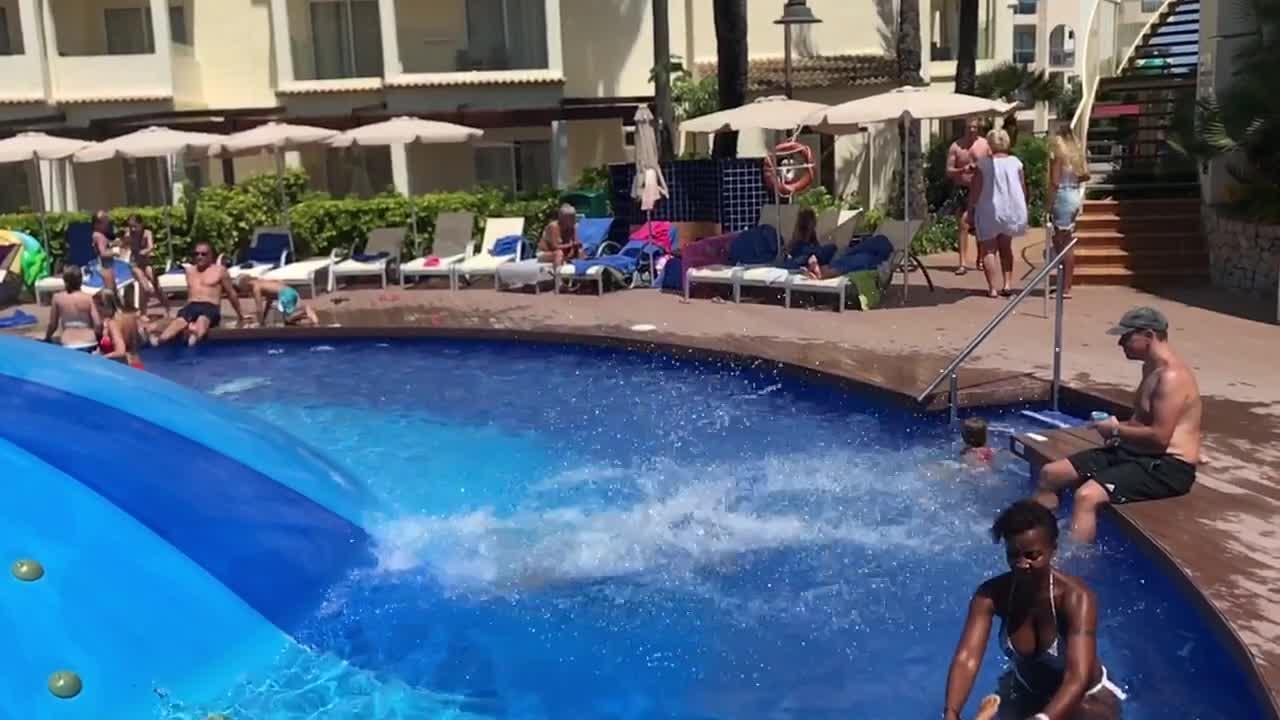 Kid Slips and Falls into Water Trying to Backflip off Pool Float ...