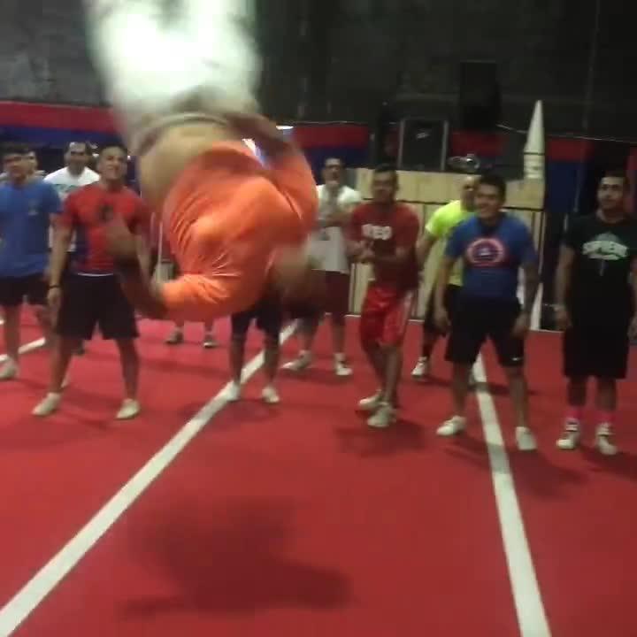 Crowd Falls Backward When Gymnast Lands Tumble Sequence | Jukin Licensing