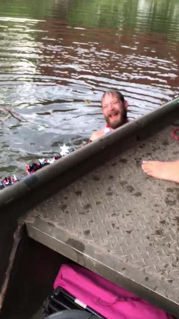 Man Falls Off Boat Trying to Break Tree Branch | Jukin Licensing