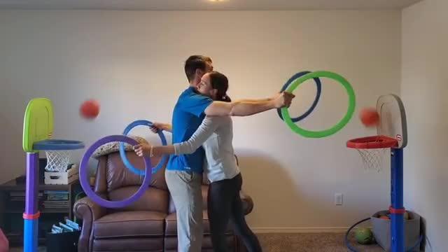 Juggling Couple Make Mini Basketball Trick Shots | Jukin Licensing