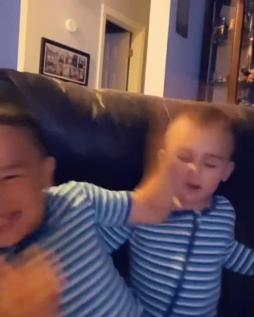 Twin Kids Playfully Slap Each Other | Jukin Licensing