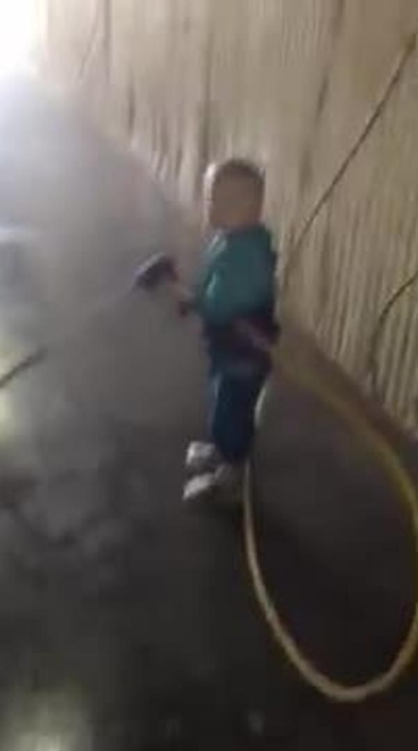 Little Kid Knocks Himself over at Car Wash | Jukin Licensing