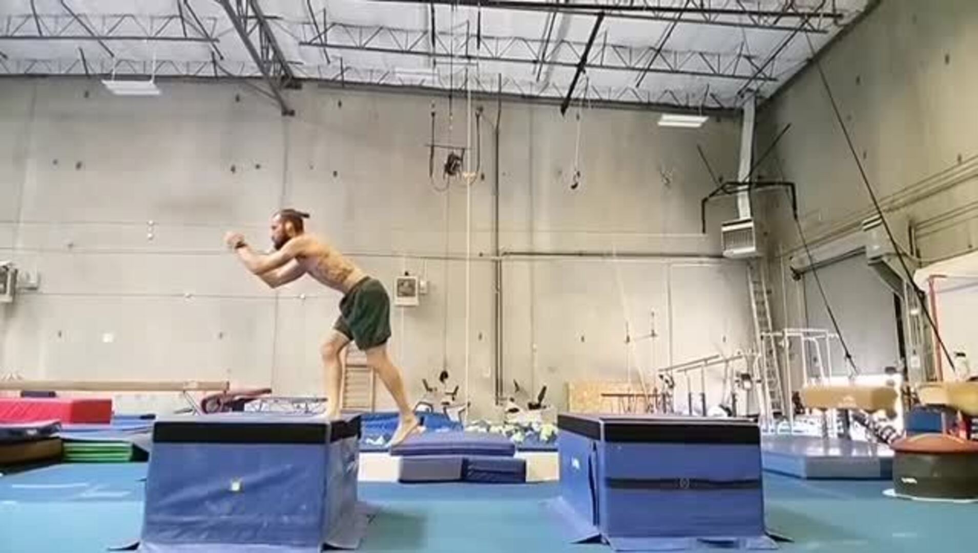 Man Performs Mind-Blowing Long Distance Jump While In Handstand ...