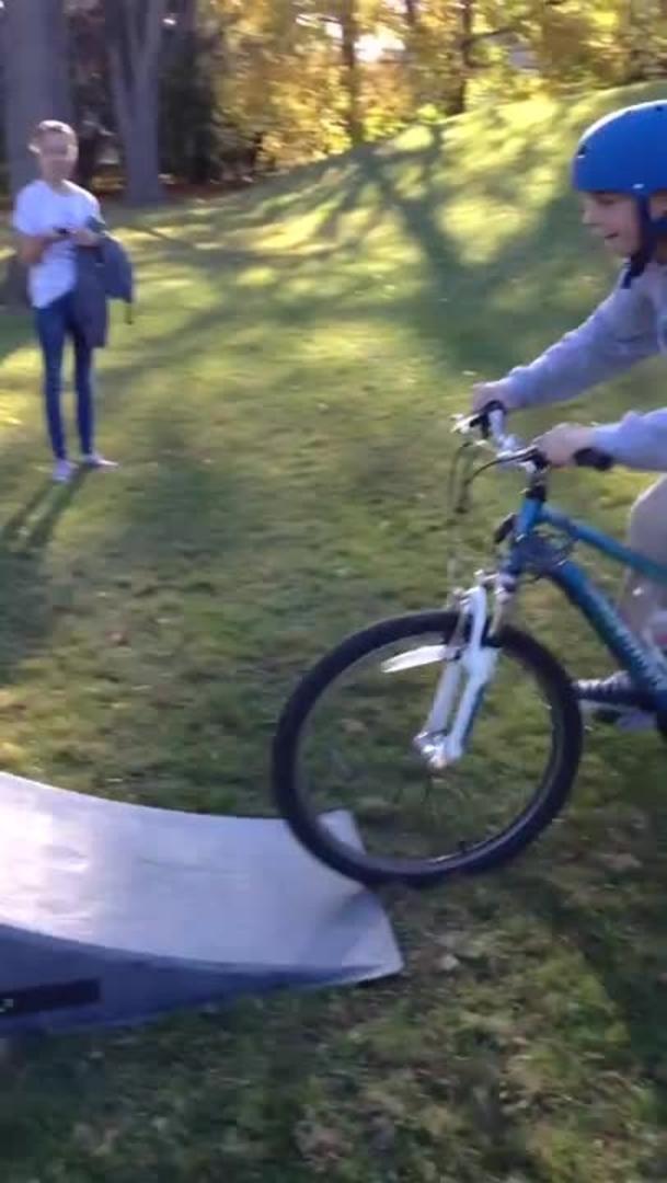 Girl Flies over Bicycle Handlebar | Jukin Licensing