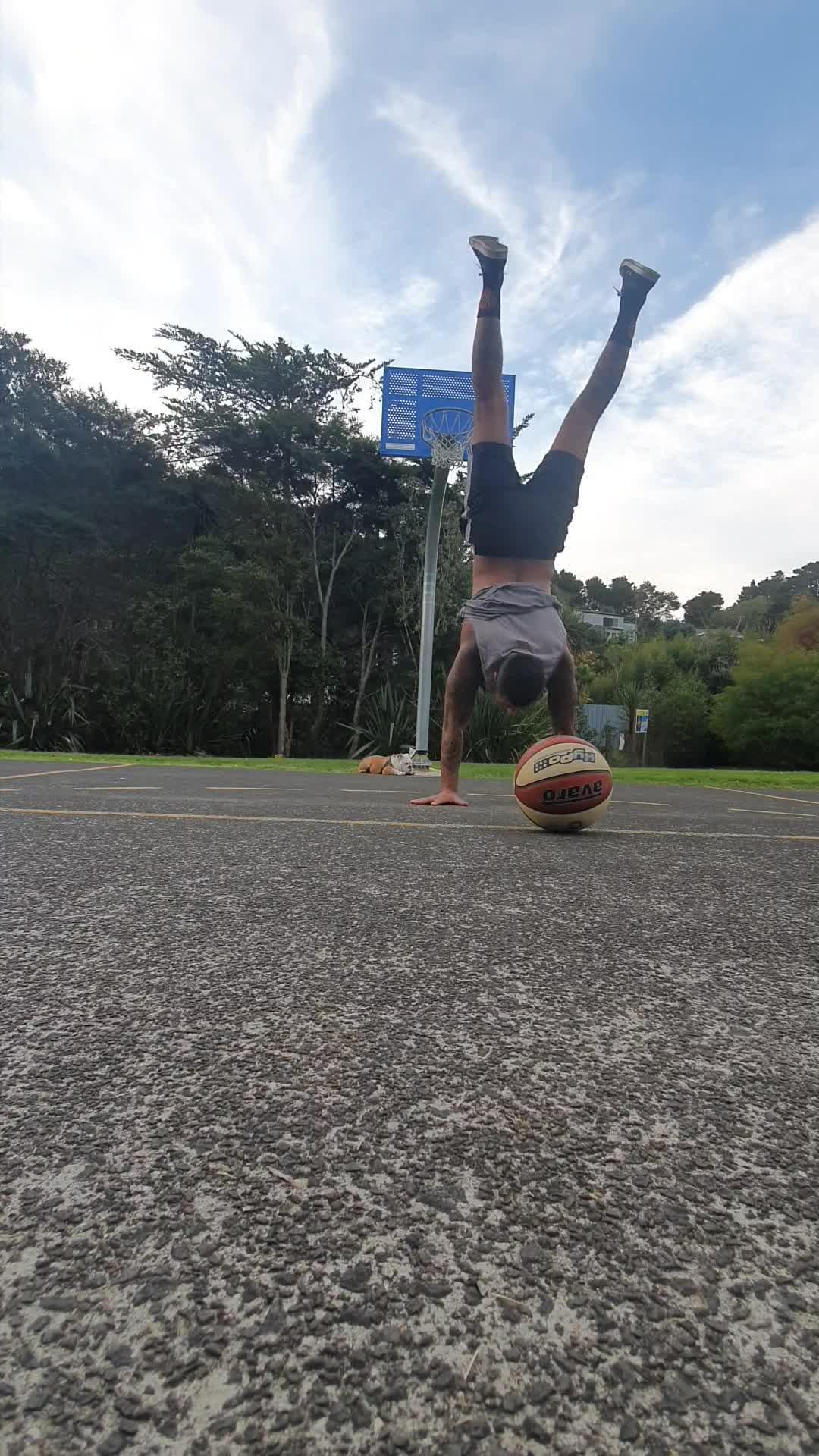 Guy Scores Basketball Trick Shot While Doing Handstand | Jukin Licensing