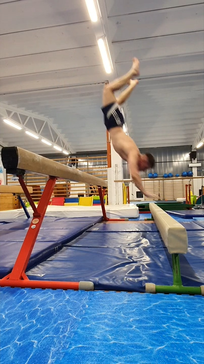 Guy Performs Handstand Jump From One Balance Beam to Another | Jukin ...