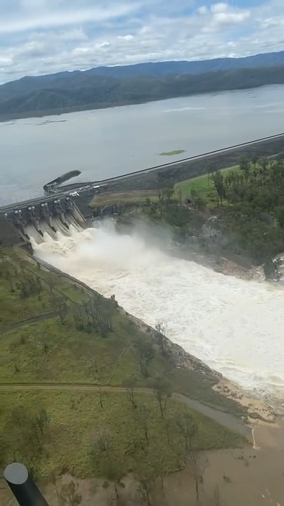Aerial View of Flood Water Gushing Through Dams | Jukin Licensing