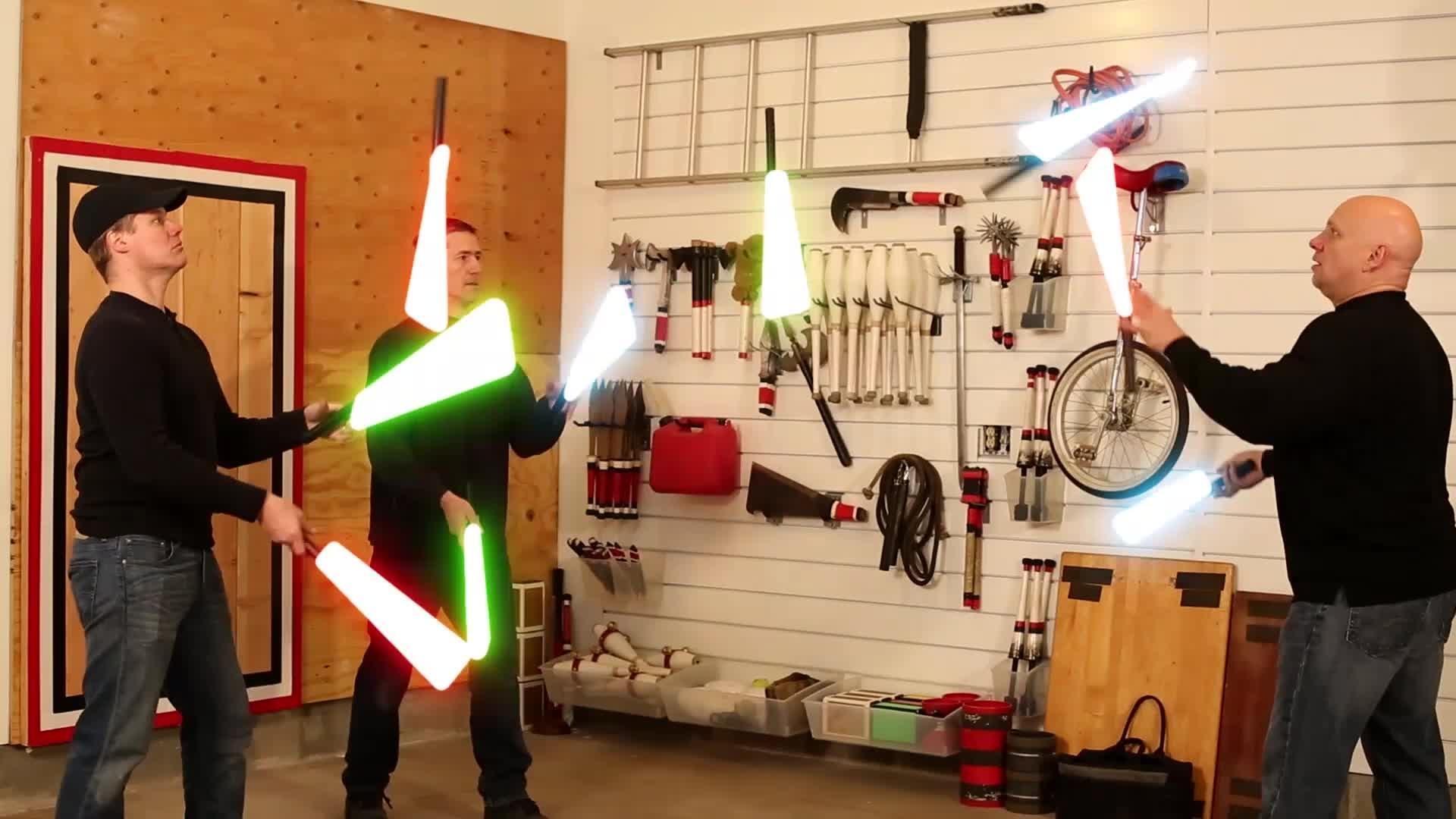 Guys Juggle Energy Swords | Jukin Licensing