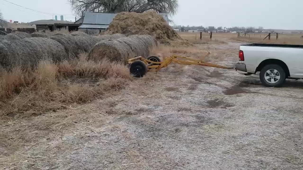 Car Loads Hay Bale Using Buggy | Jukin Licensing