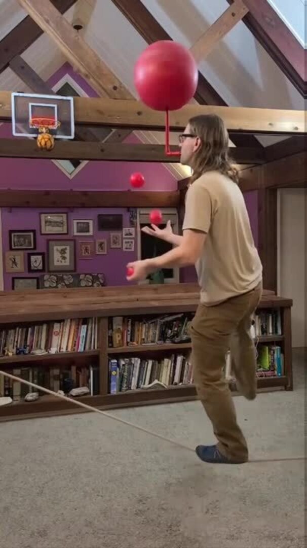 Man Performs Basketball Trick Shot While Juggling On Slackline | Jukin ...