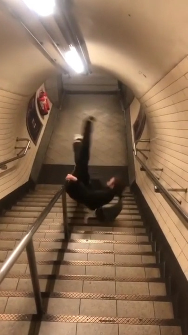 Guy Hilariously Falls While Sliding Down Rail | Jukin Licensing