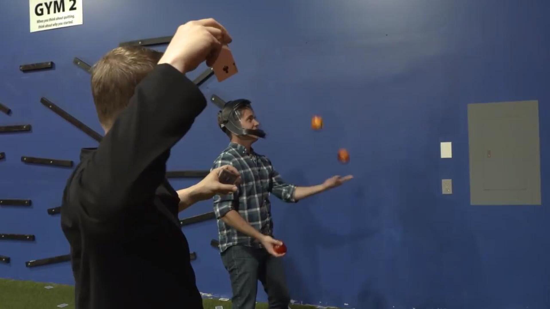 Illusionist And Juggler Show Cool Trick Shots While Throwing Cards ...